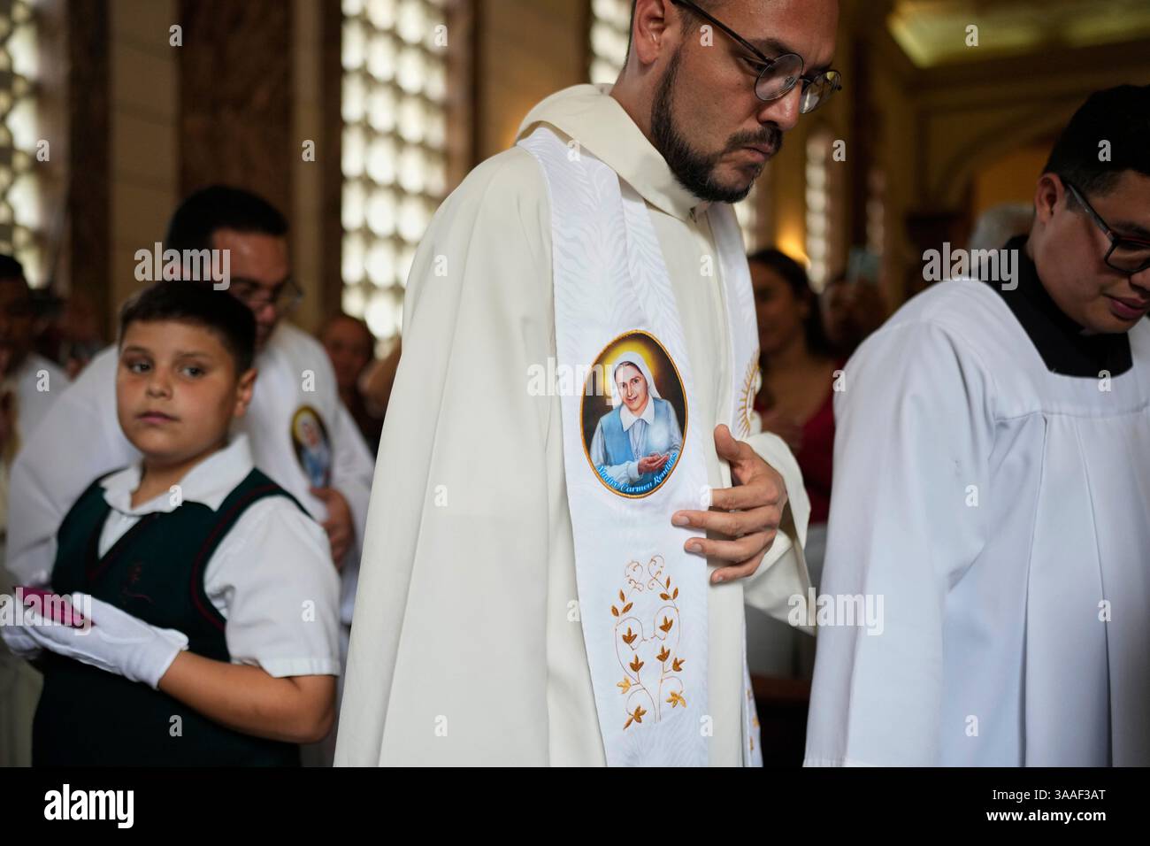 A priest attends a celebratory Mass for Blessed Maria Carmen Rendiles ...