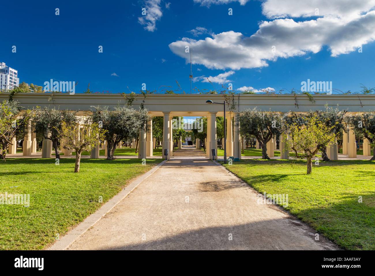 Pergola and walking path thoguh Turia Garden (Jardín del Turia) near ...