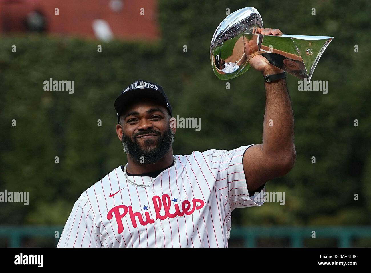 Former Philadelphia Eagles's Brandon Graham holds up the Vince Lombardi ...