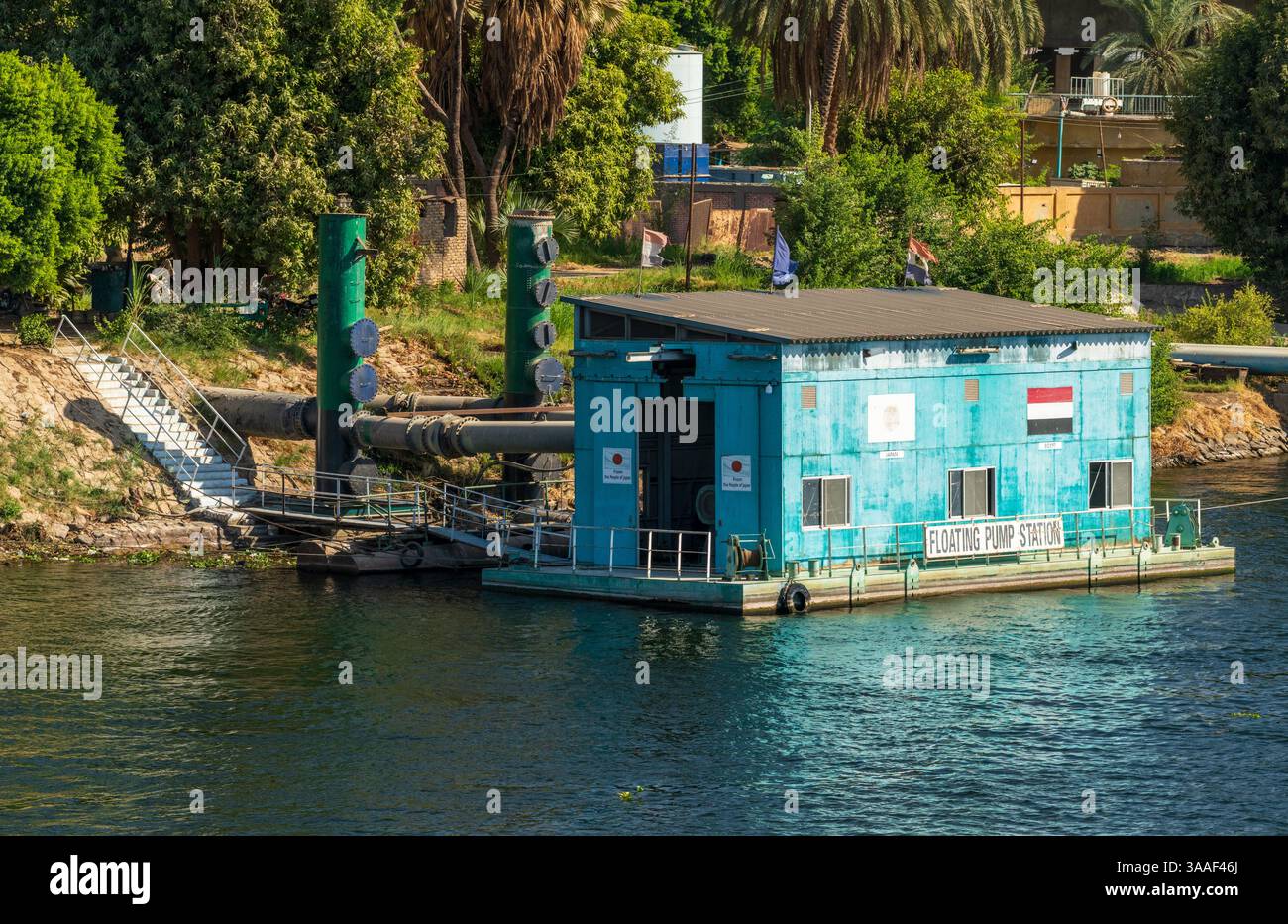 Floating pump station provided by people of Japan alongside Nile River ...