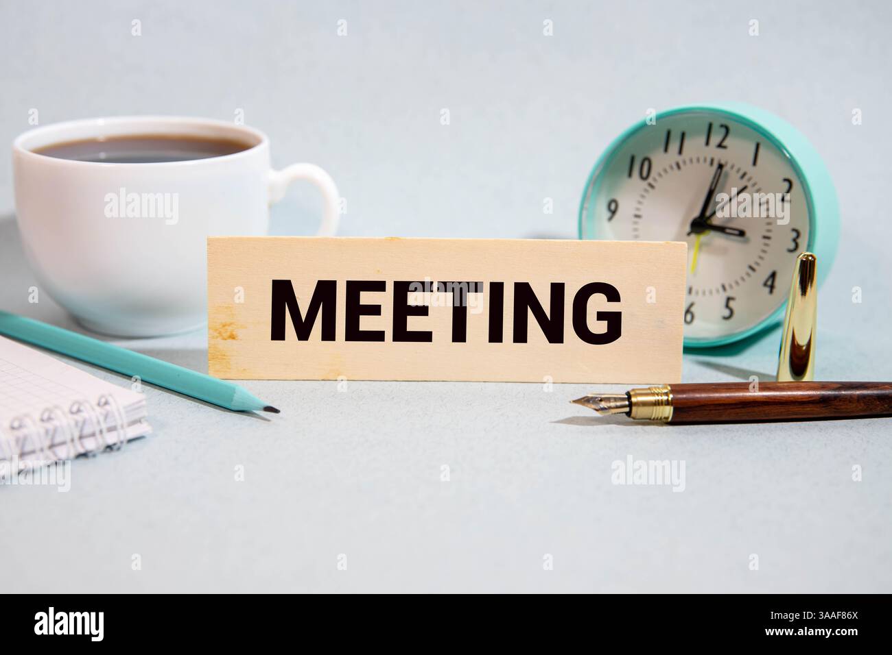 MEETING word written on wood block. MEETING text on wooden table for ...