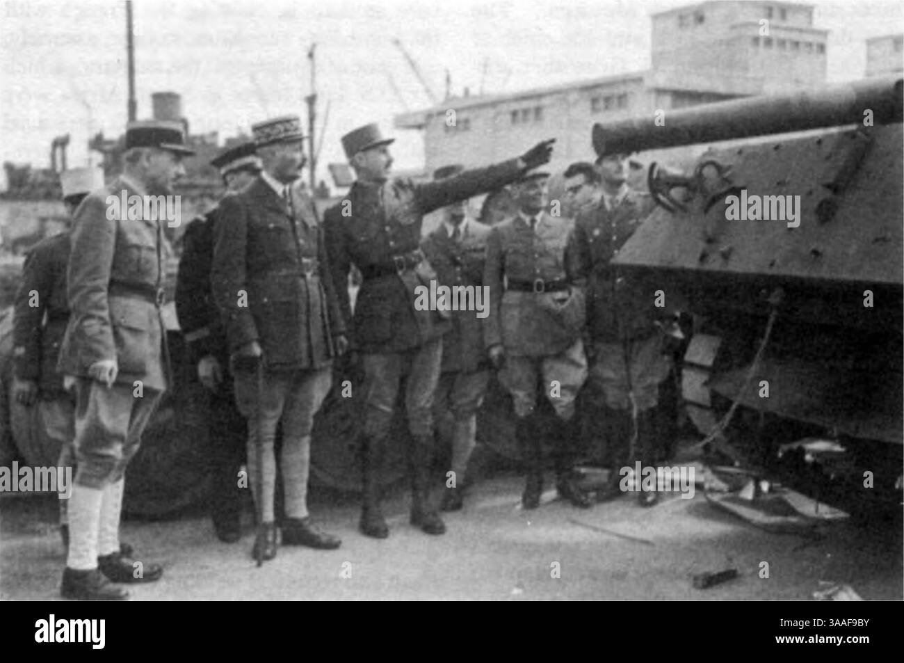 Inspecting US equipment to be used by French Army. From left, Col ...