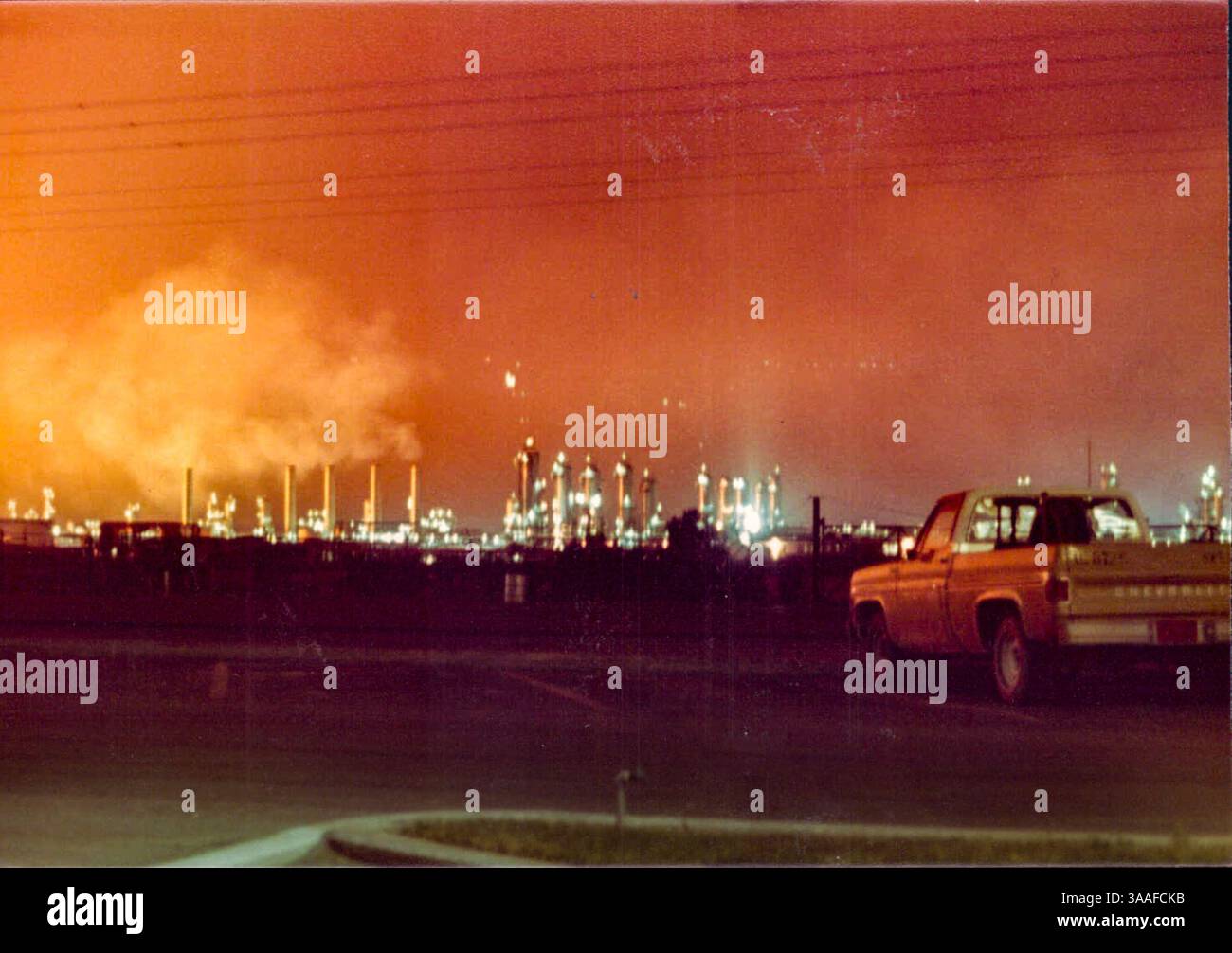 Aramco Plant with orange sky, Abqaiq, Saudi Arabia, 1970s-1980s Stock ...