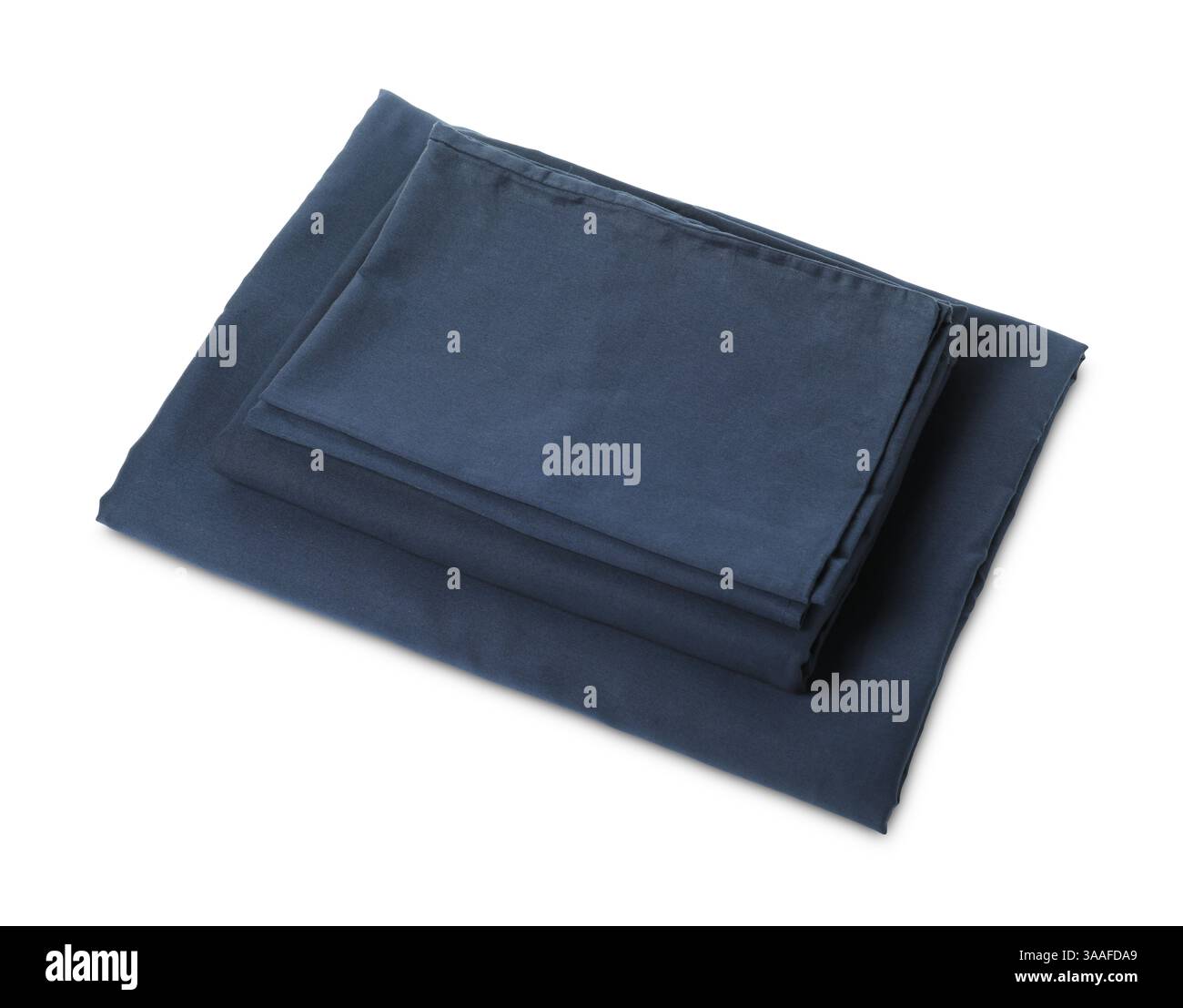 Stack of silky bed linens on white background Stock Photo - Alamy