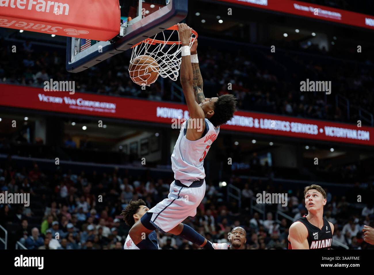 Washington Wizards guard AJ Johnson (5) dunks the ball during the first ...