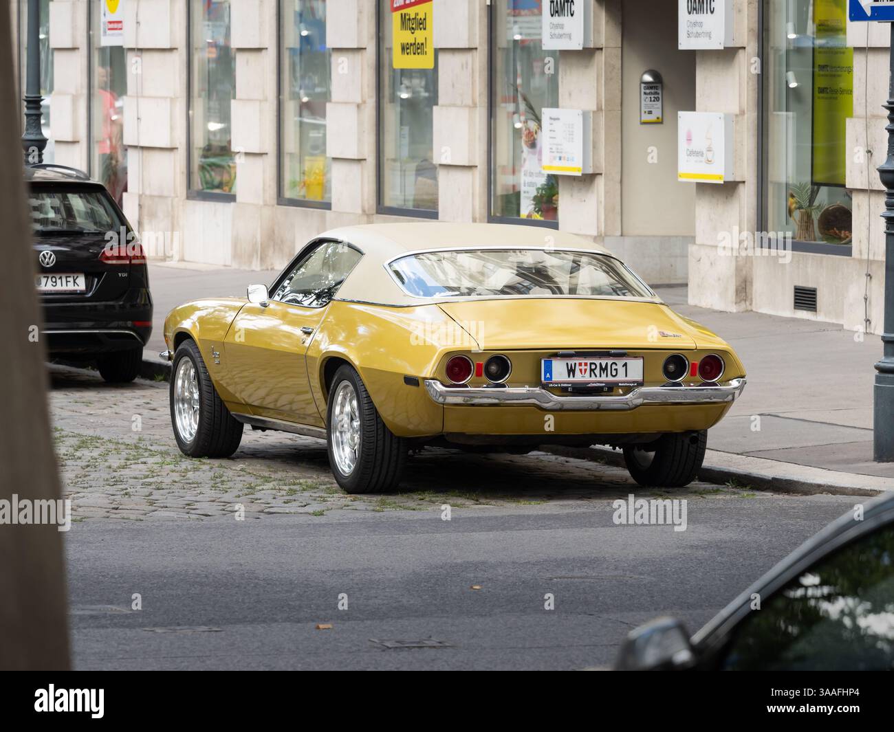 Chevrolet Camaro muscle car from the 1970s rear view. The restored ...