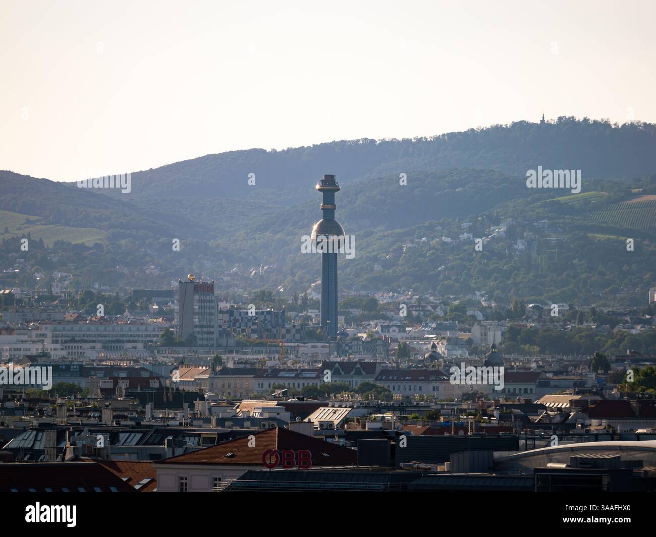 The Spittelau incinerator tower with the golden sphere in the cityscape ...