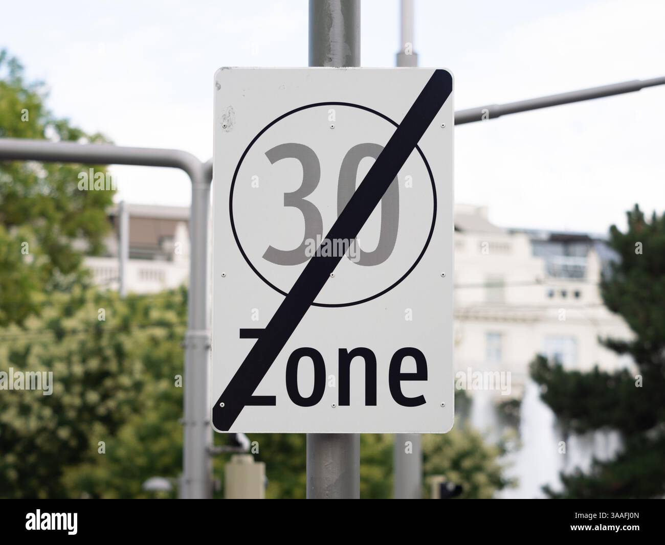 End of 30 Zone speed limit sign in Austria. The traffic sign is mounted ...