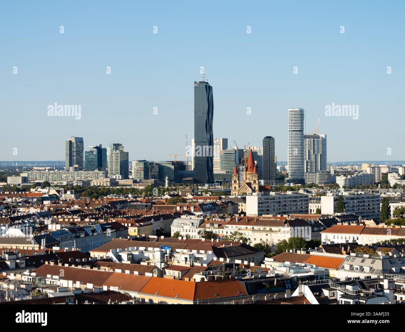 Vienna cityscape with skyscraper buildings. View over the rooftops with ...
