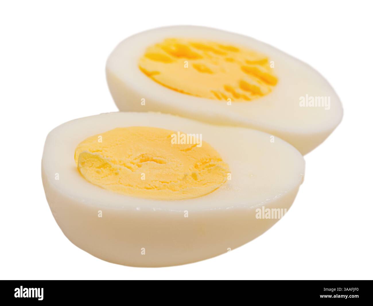 Boiled egg cut into two parts isolated on white background Stock Photo ...
