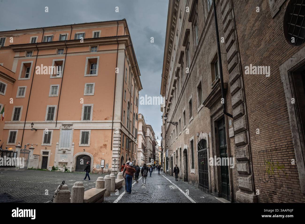 Narrow street in rome pedestrians hi-res stock photography and images ...