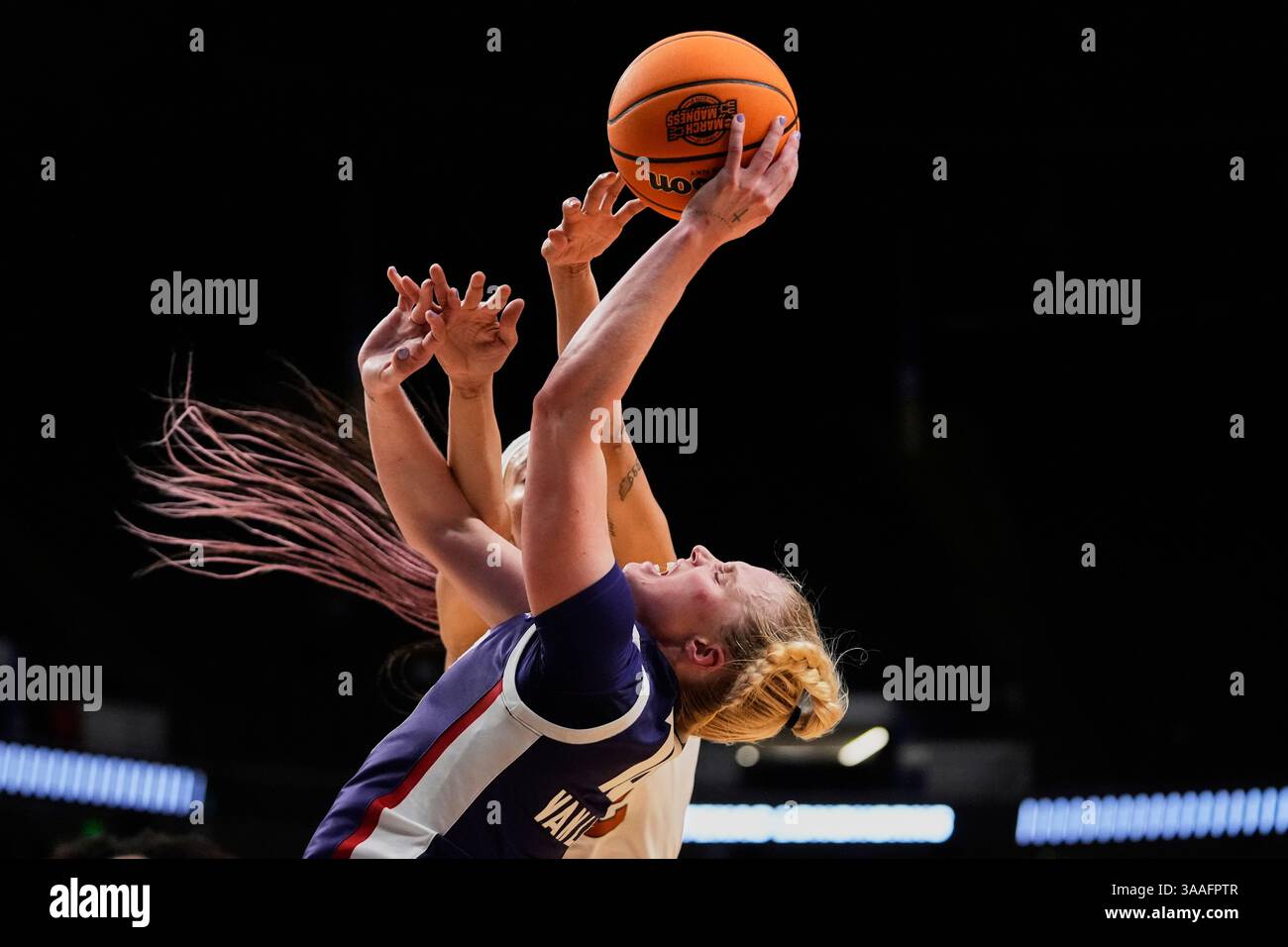 TCU guard Hailey Van Lith (10) is blocked by Texas guard Ndjakalenga ...