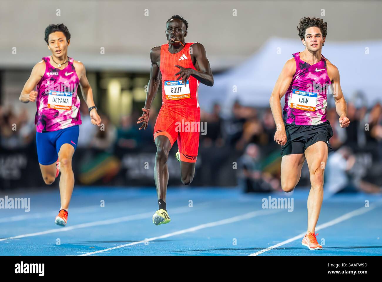 Sprinter Gout Gout (center) seen in action with Calab Law in the 200m ...