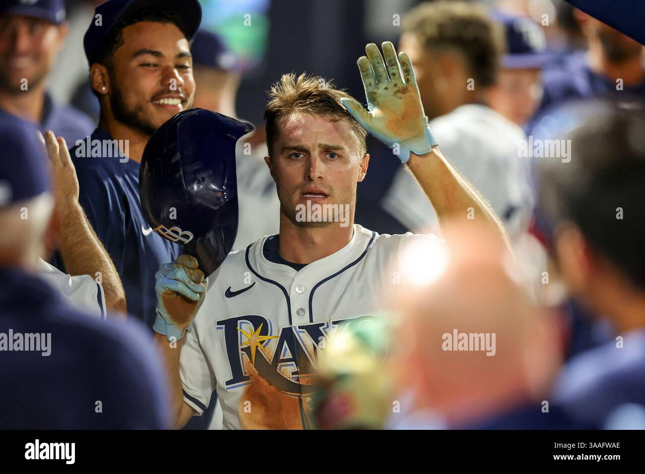 Tampa Bay Rays' Jake Mangum celebrates with teammates after hitting in ...