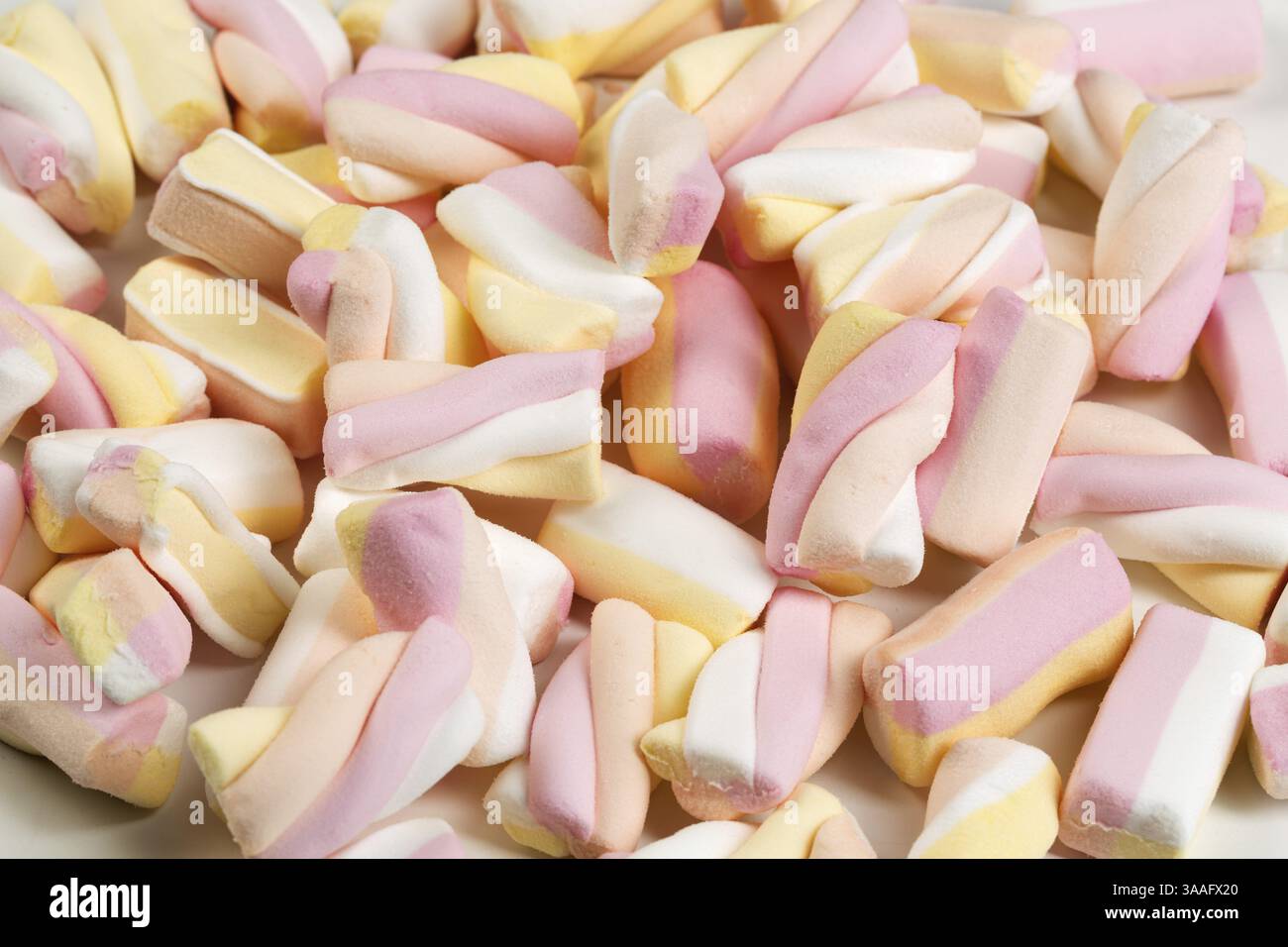 Chewy sweets background. Isolate on white Stock Photo - Alamy