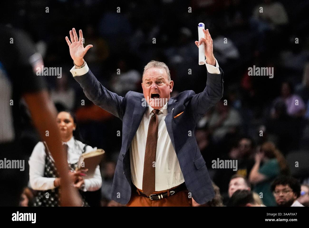 Texas head coach Vic Schaefer calls out from the bench during the ...
