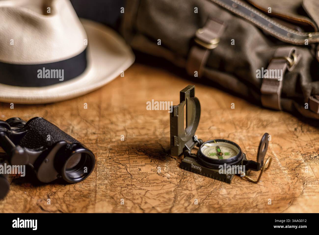 Old expedition map with compass and binoculars Stock Photo - Alamy