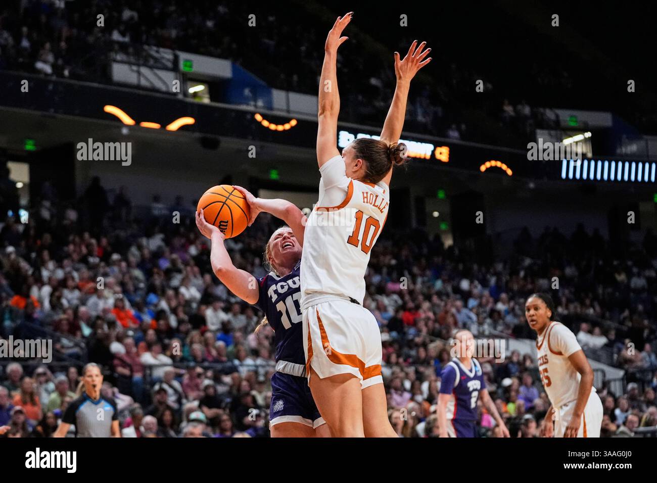 TCU guard Hailey Van Lith (10) goes to the basket agains Texas guard ...