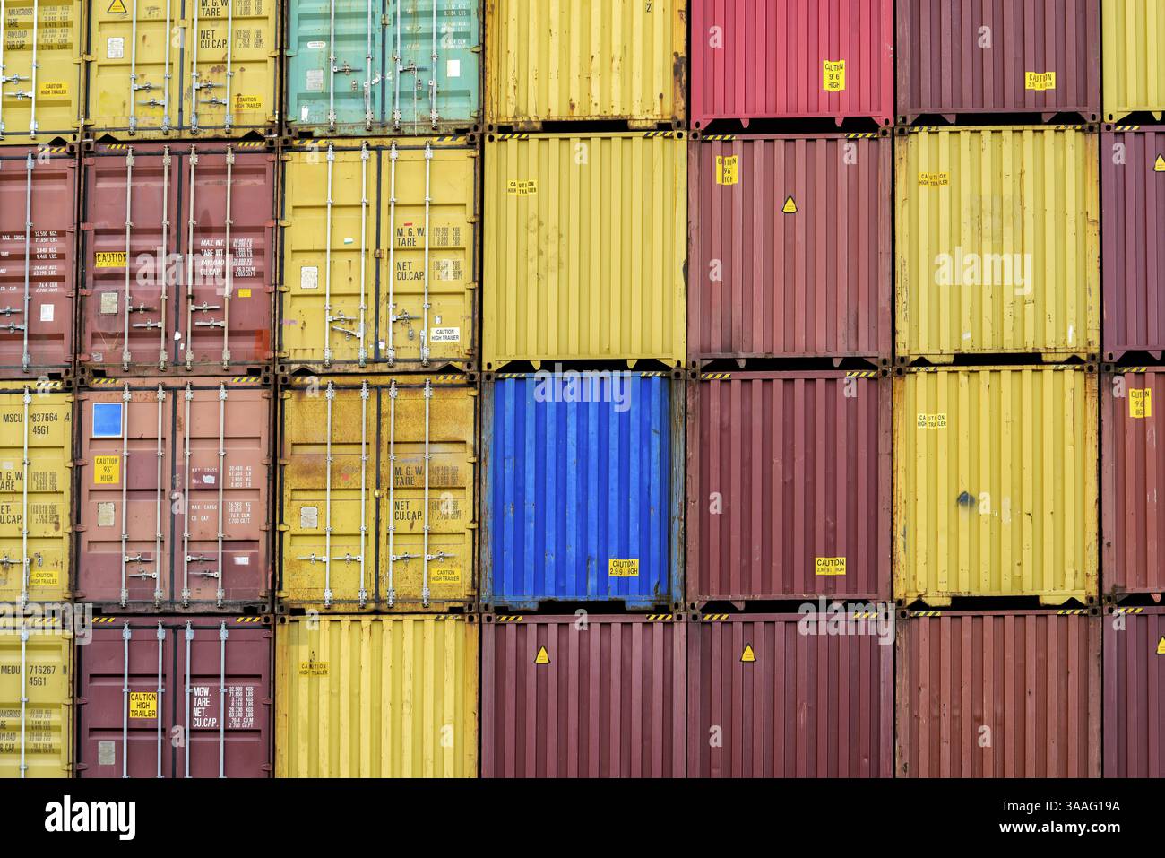 Standard shipping container in a container terminal in front of loading ...