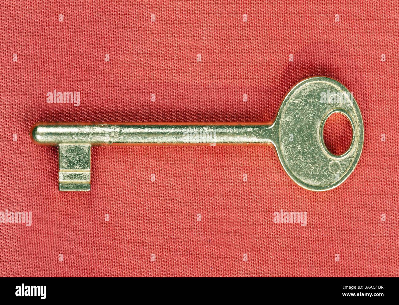Old golden key to the door isolated on white background Stock Photo - Alamy