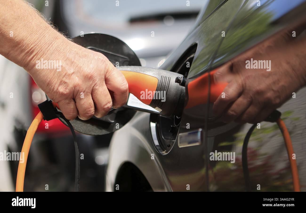 E-Mobility, Charging an electric car Stock Photo - Alamy