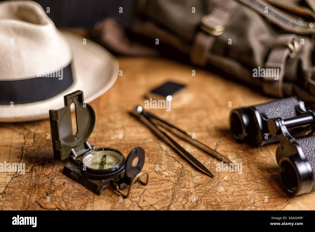 Old expedition map with compass and binoculars Stock Photo - Alamy