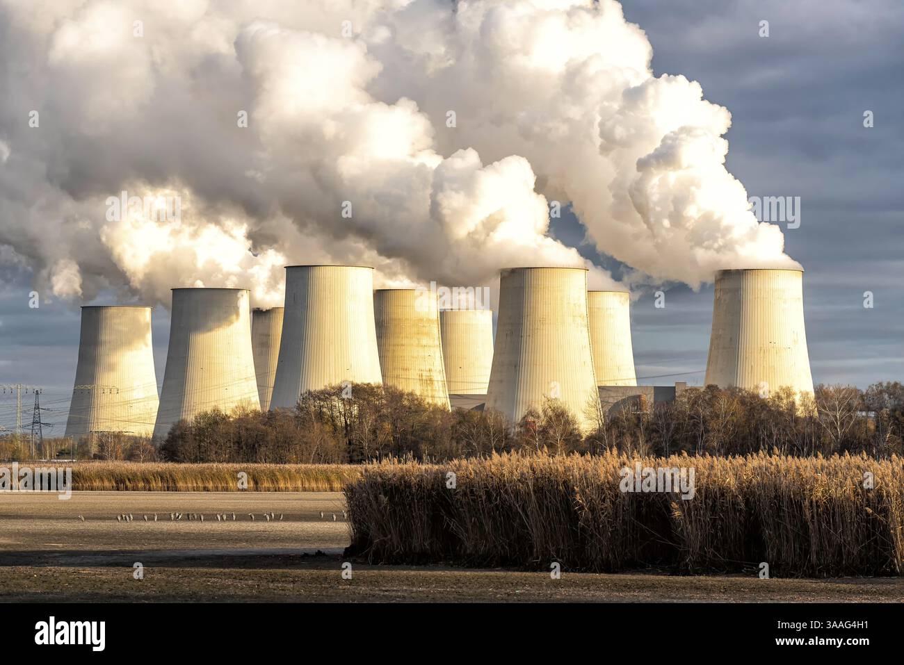 Towers of a power plant in Germany with huge clouds of exhaust fumes ...