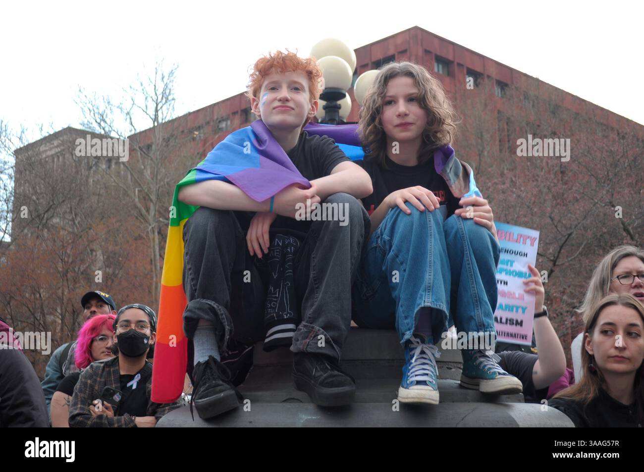New York, United States. 31st Mar, 2025. Demonstrators are draped in ...