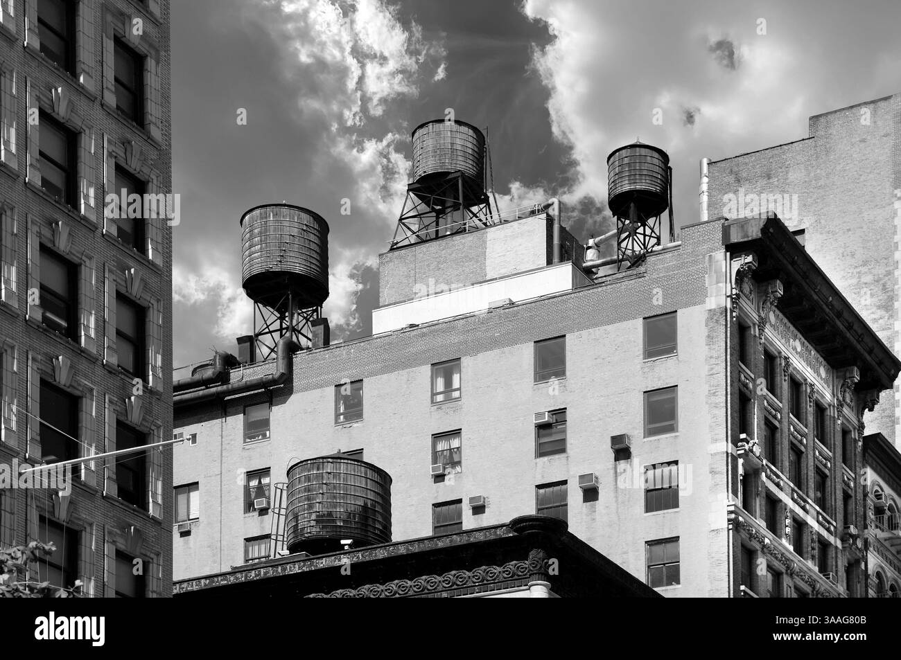 Wooden water storage tanks on the roof of a high-rise building, New ...