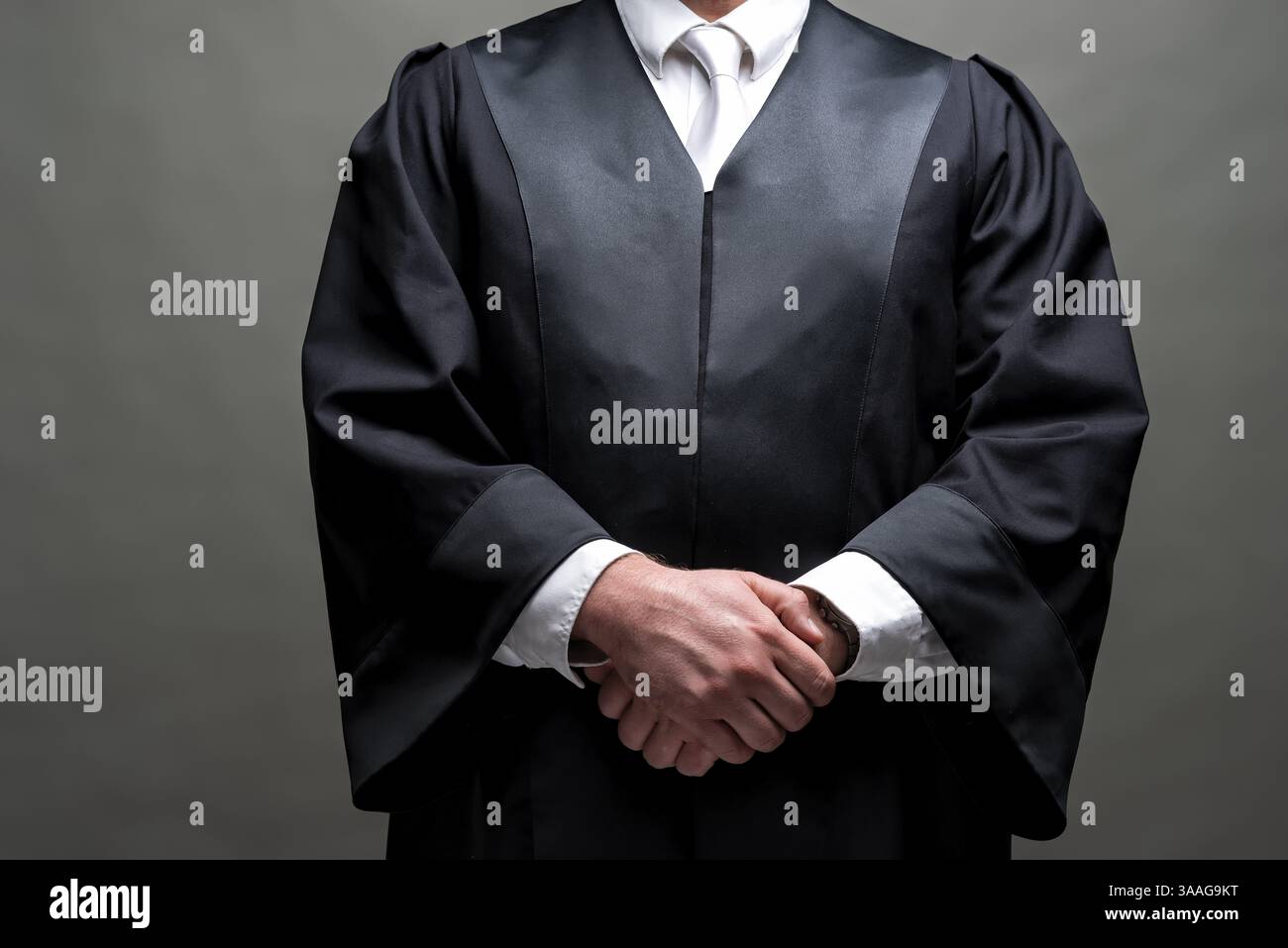 German lawyer with classic black robe and white tie Stock Photo - Alamy