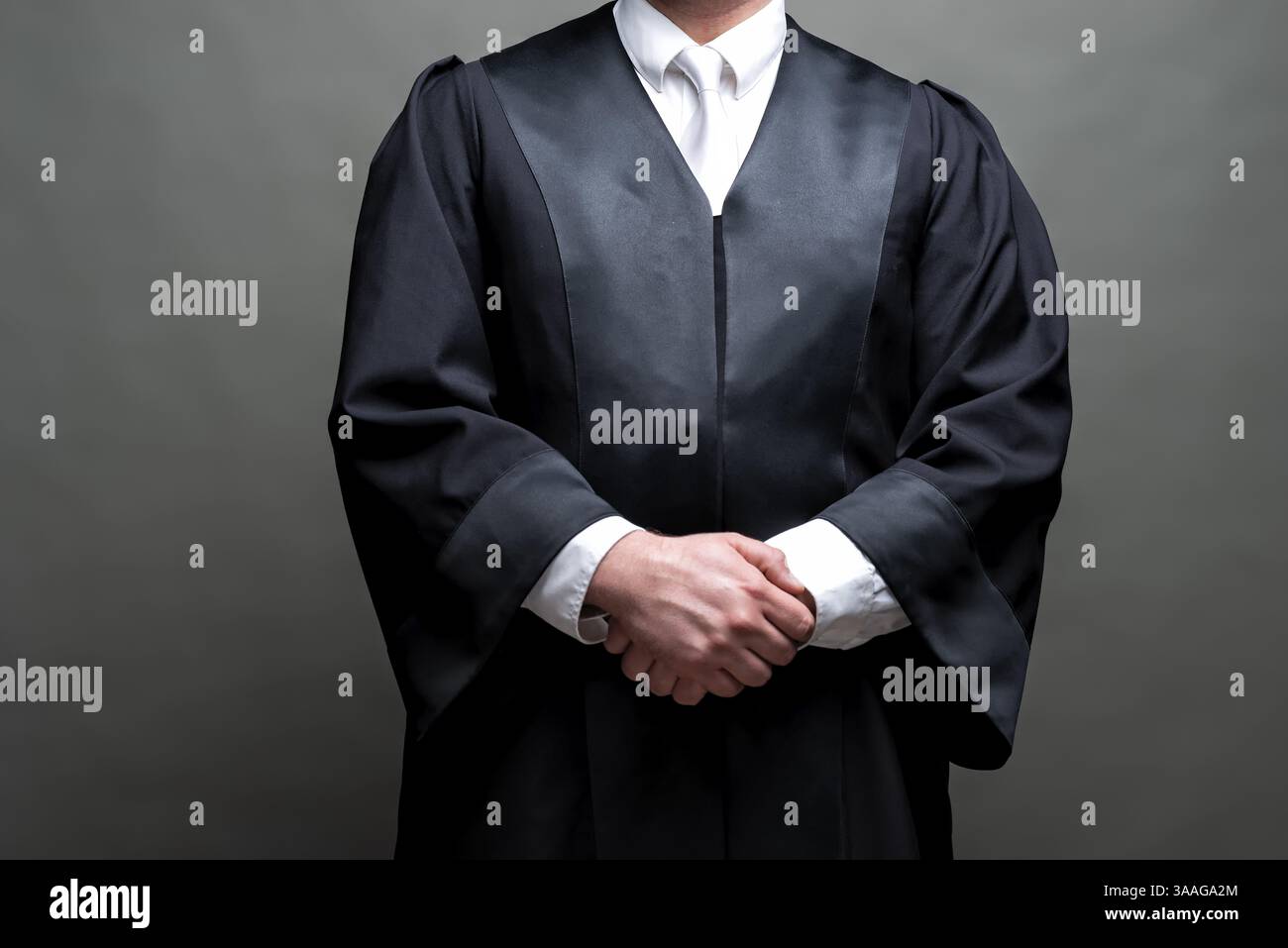 German lawyer with classic black robe and white tie Stock Photo - Alamy