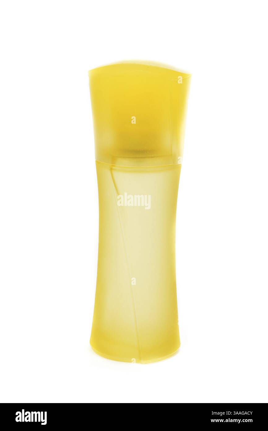 Yellow perfume bottle isolated on white background Stock Photo - Alamy