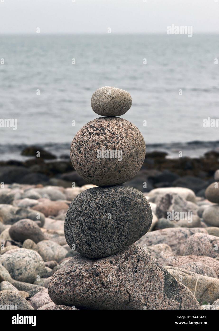 Round stones on the beach, piles Stock Photo - Alamy