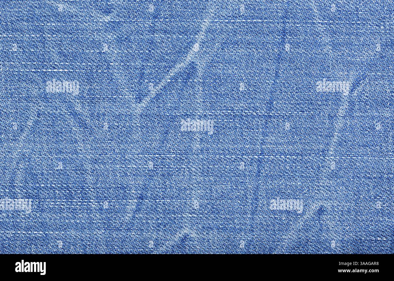 Light blue denim fabric background Stock Photo - Alamy