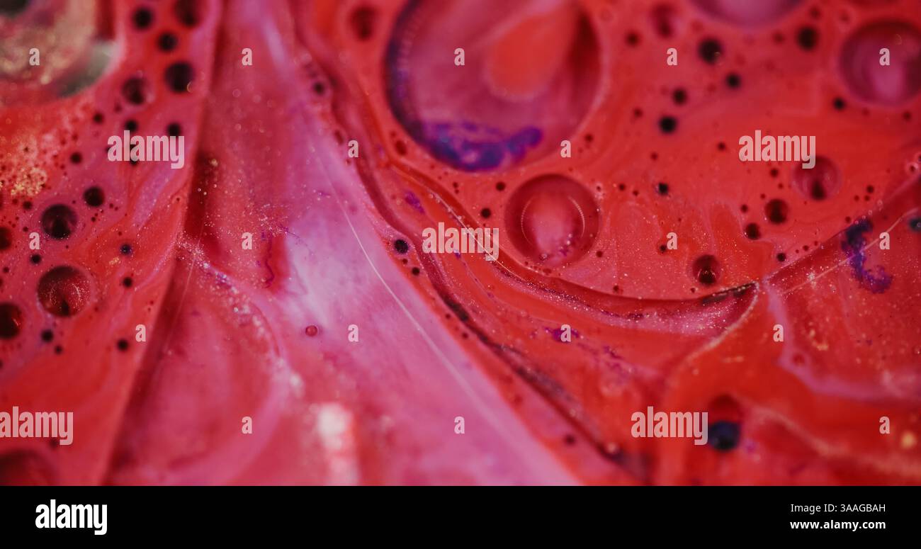 Shining fluid. Defocused glowing liquid. Blinking red sparkling bright ...