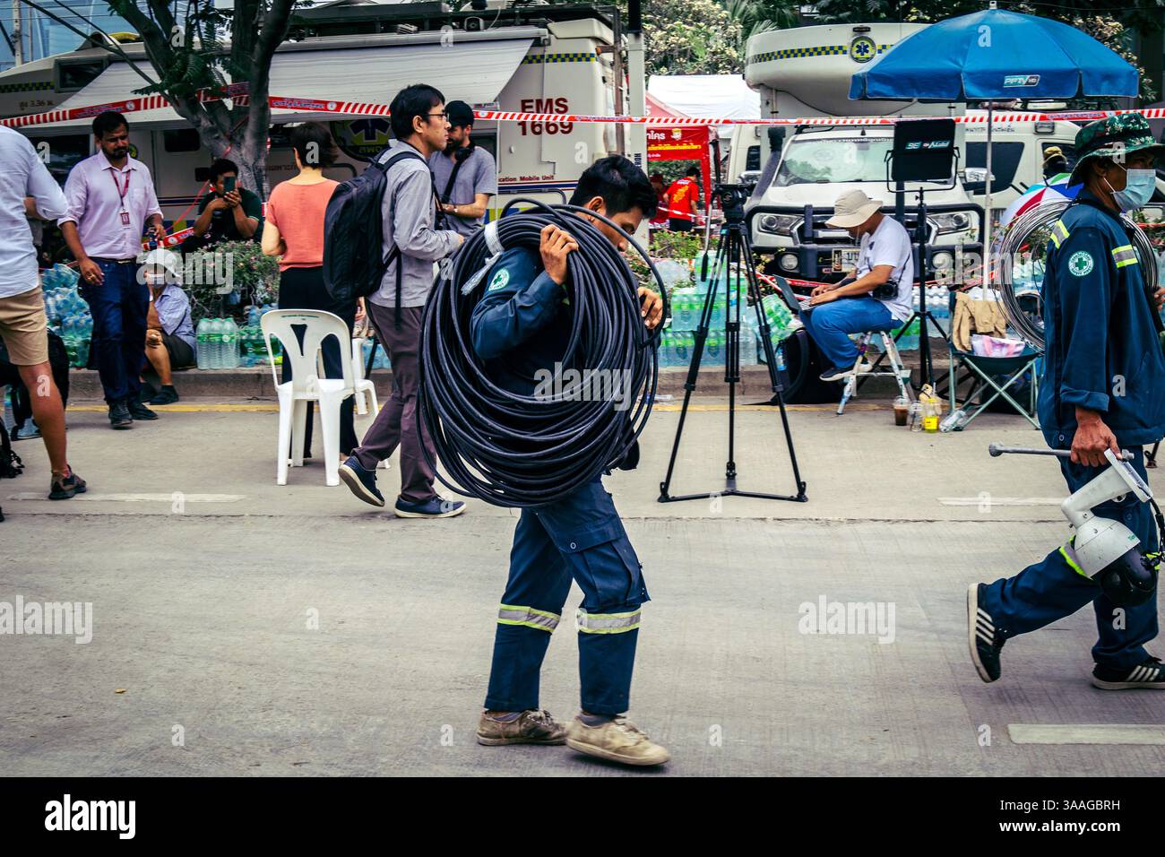 Bangkok, Thailand, March 31, 2025 Rescuers work at the site of a high ...