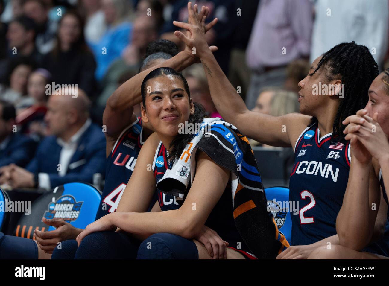 UConn center Jana El Alfy, center, looks up during the second half against Southern California ...