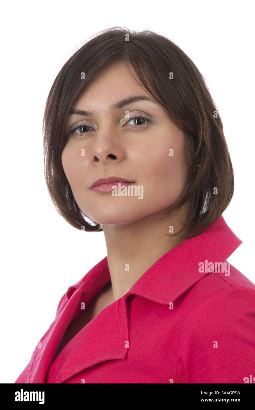 Portrait of a beautiful young brunette woman with short hair in a red ...