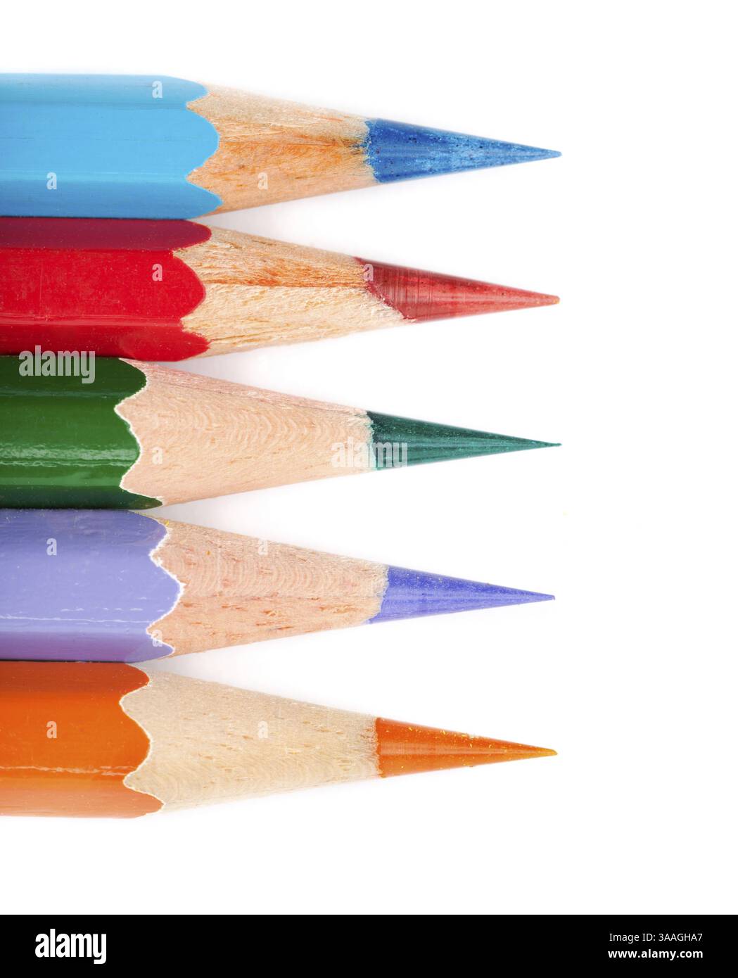 Five colored pencil line on white background Stock Photo - Alamy