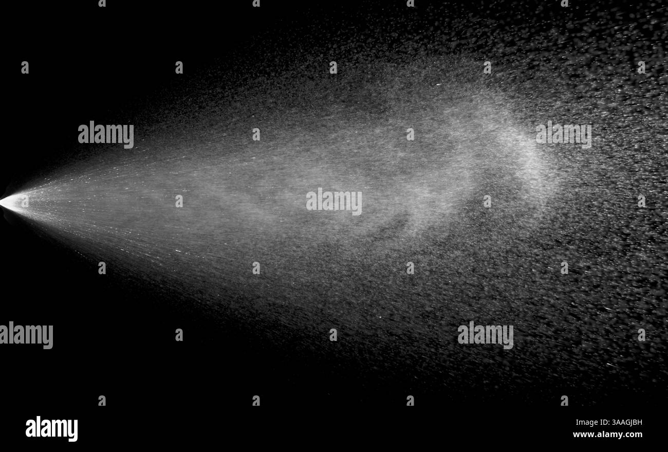 Sprinkler splashing water Black and White Stock Photos & Images - Alamy