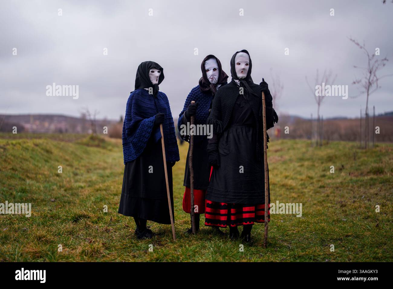 Revelers dressed as "Mascaritas" take part in a traditional carnival ...