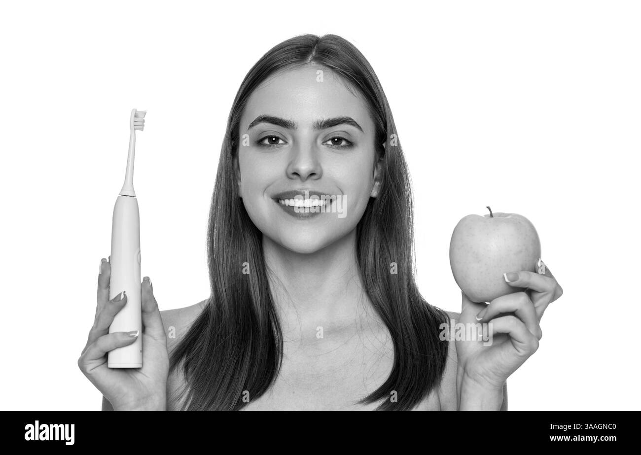 Electric toothbrush. Woman toothy smile isolated on white. Woman ...