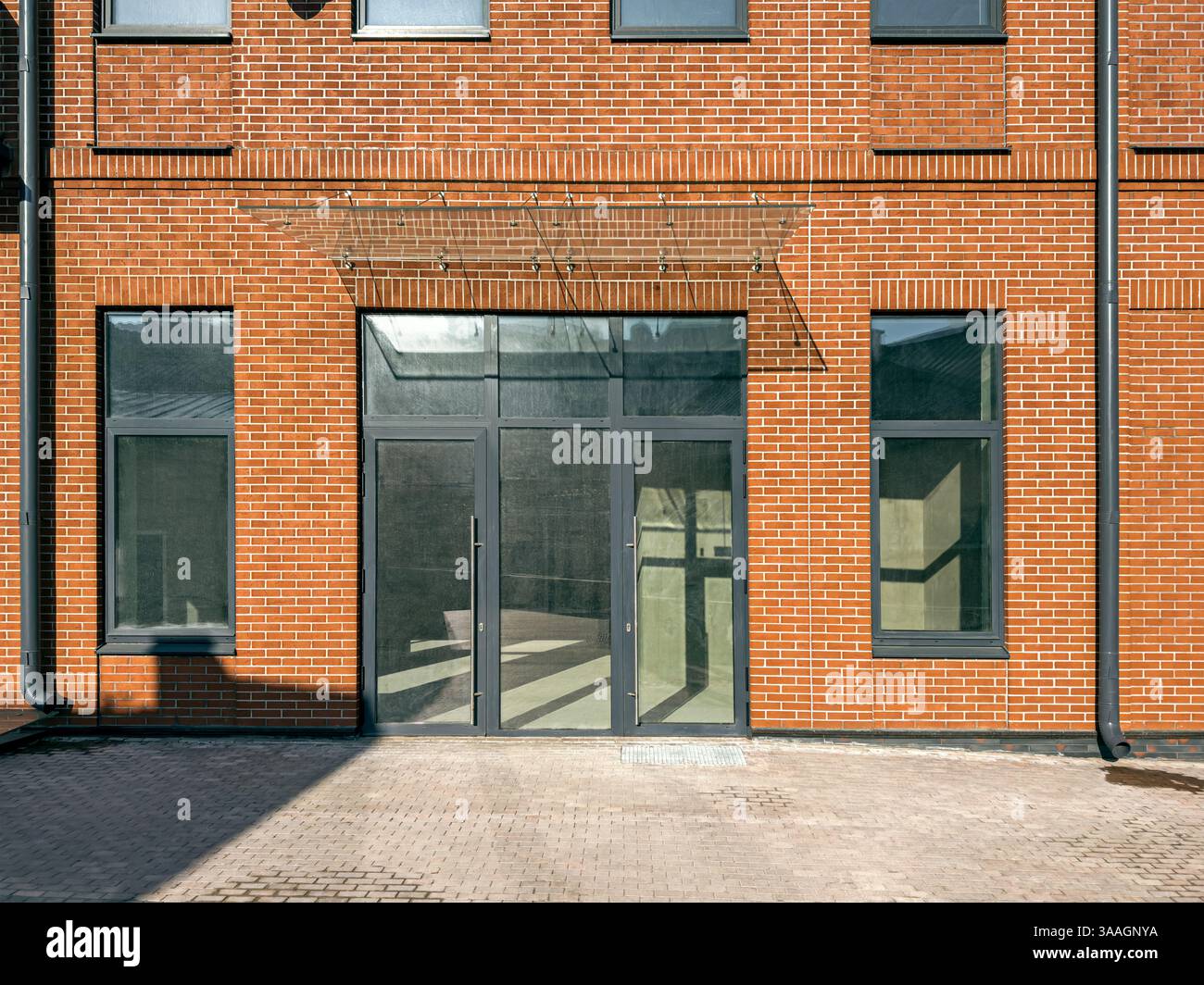 newly renovated old building facade. refurbishment of old brick ...