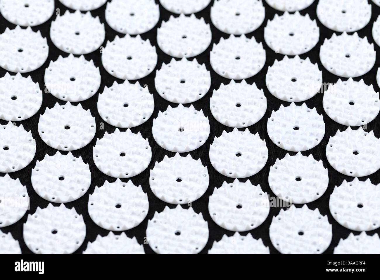 Background. Massage mat with plastic circular needles. For relaxation ...