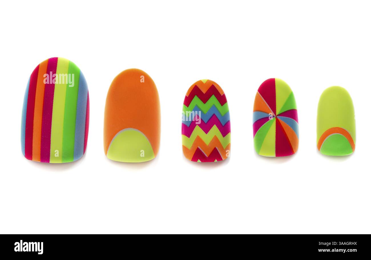 Colored, plastic artificial nails on a white background Stock Photo - Alamy