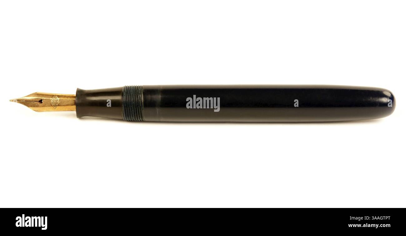 The old pen with gold nib isolated on white background Stock Photo - Alamy