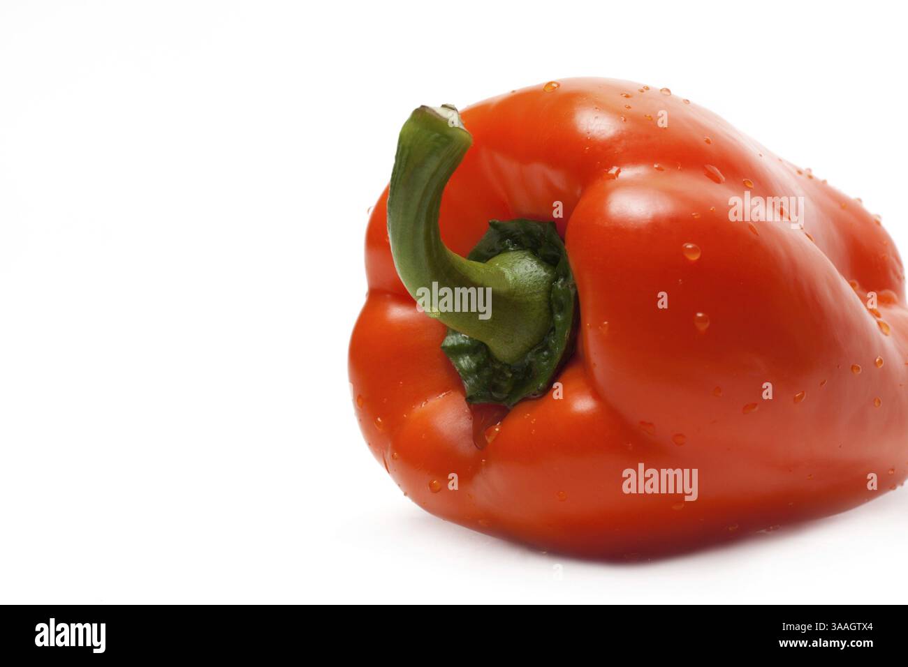Orange bulgarian pepper insulated on white background Stock Photo - Alamy
