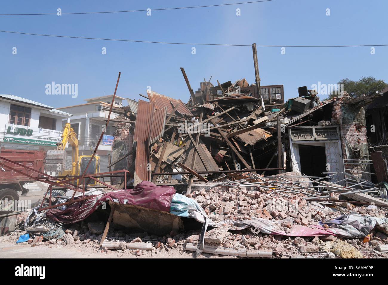 Damaged buildings are seen in the aftermath of Friday's earthquake in ...