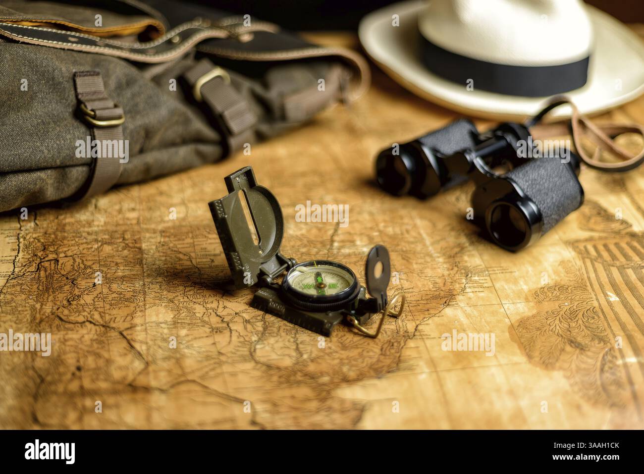 Old expedition map with compass and binoculars Stock Photo - Alamy