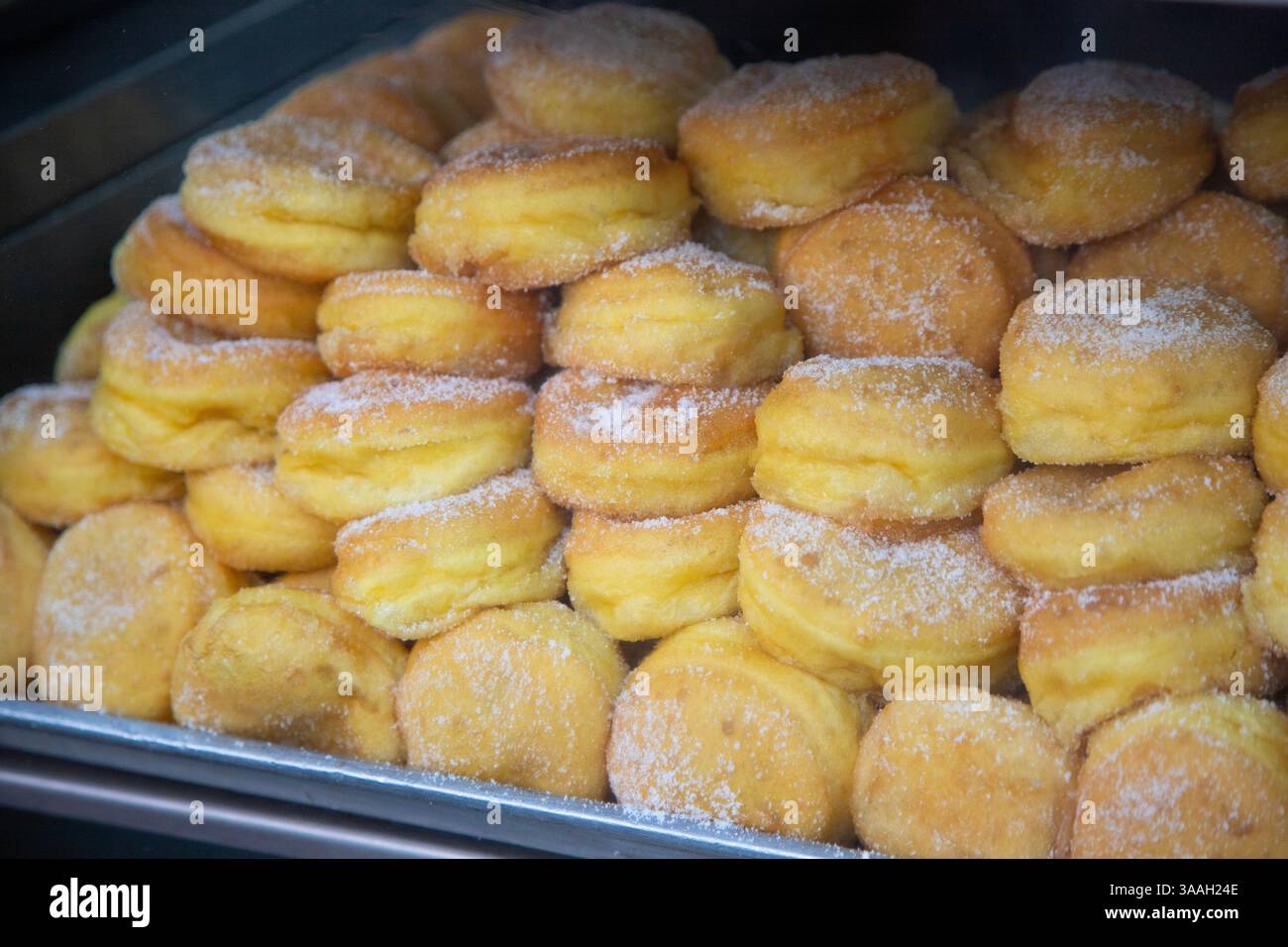 Traditional candy stand with churros, honey and typical pastries from ...
